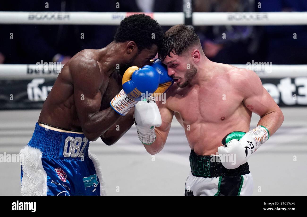 Kingsley Egbunike (left) and Lee Cutler in action during their English ...