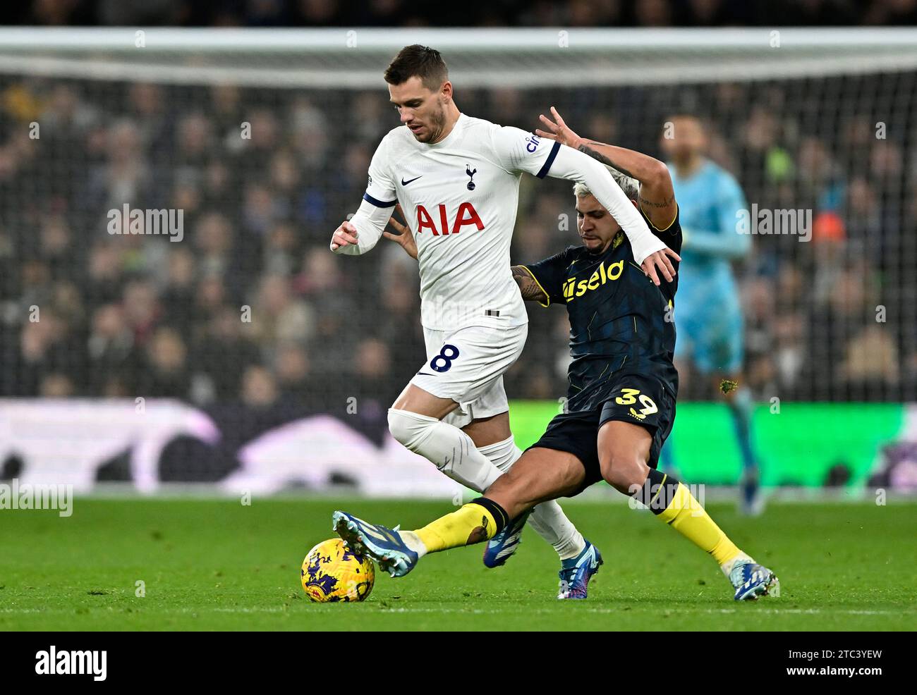 London, UK. 10th Dec, 2023. Giovani Lo Celso (Tottenham) is tackled by ...