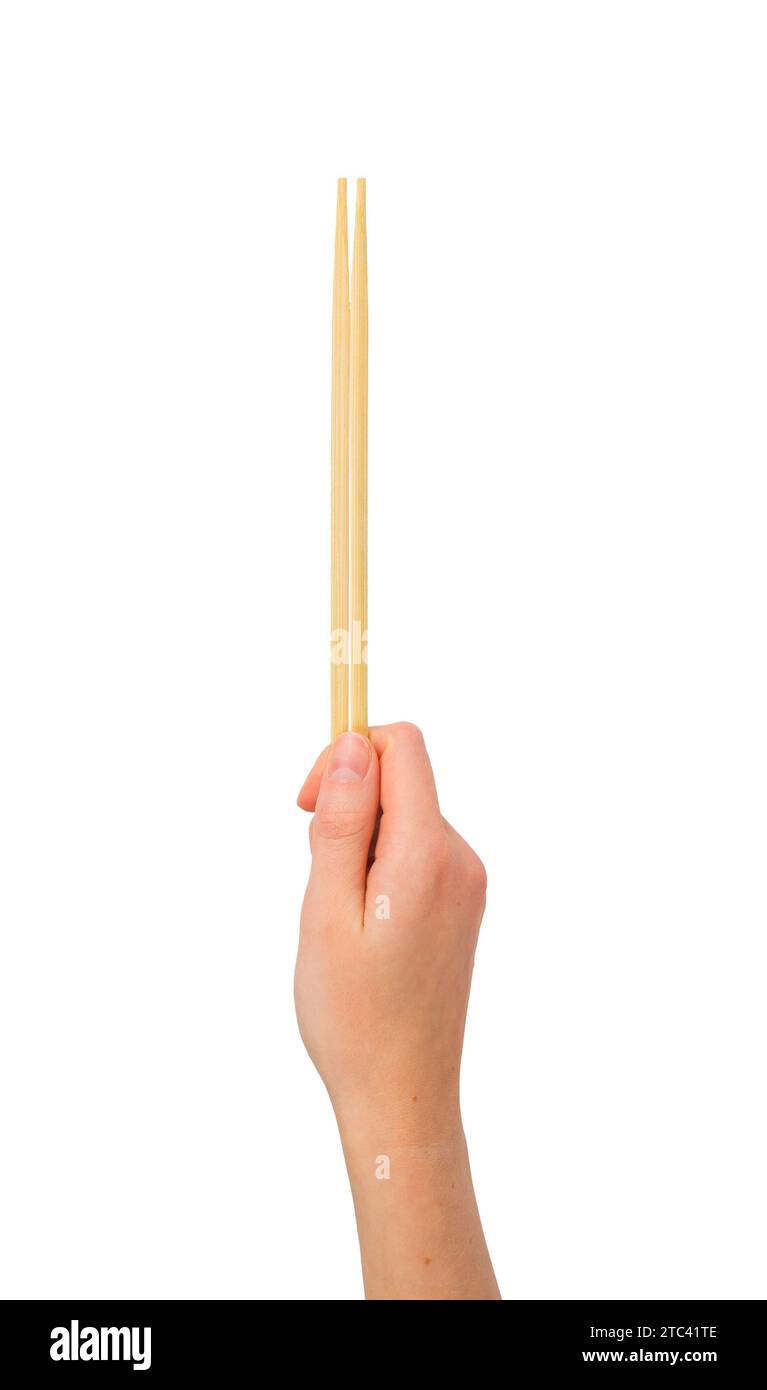 Hand holding chopsticks isolated on white background Stock Photo - Alamy
