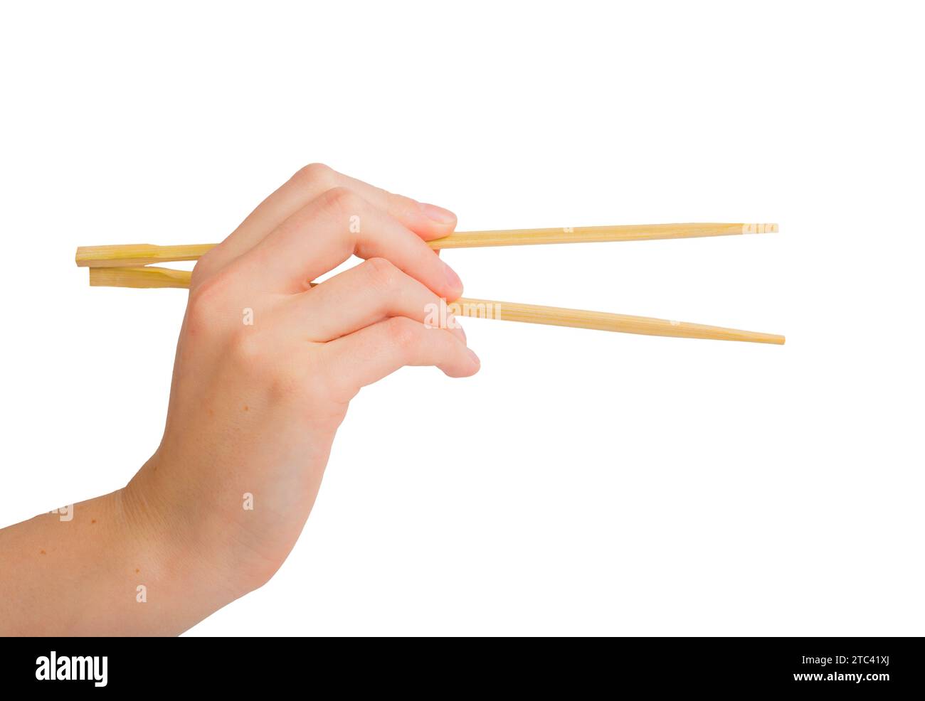 Hand holding chopsticks, Asian food sticks isolated on white background ...