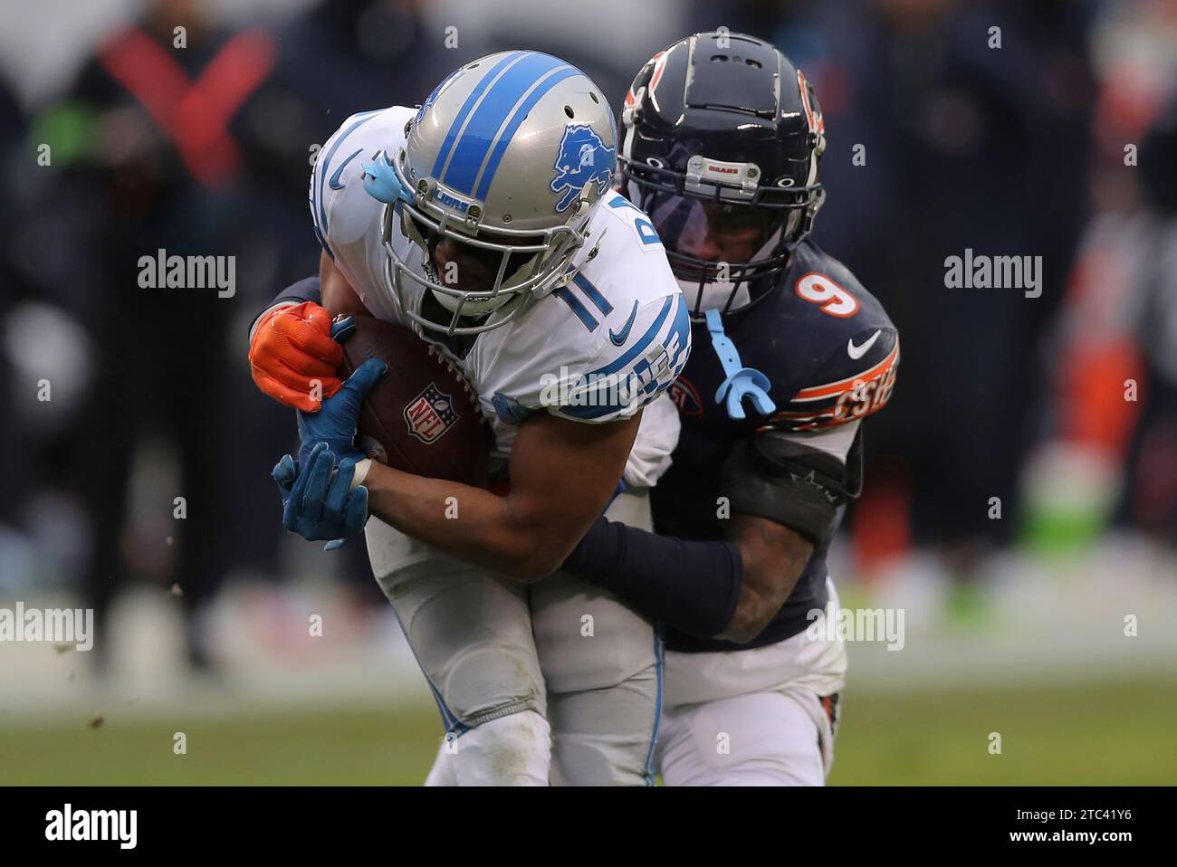 Chicago Bears safety Jaquan Brisker (9) tackles Detroit Lions wide ...