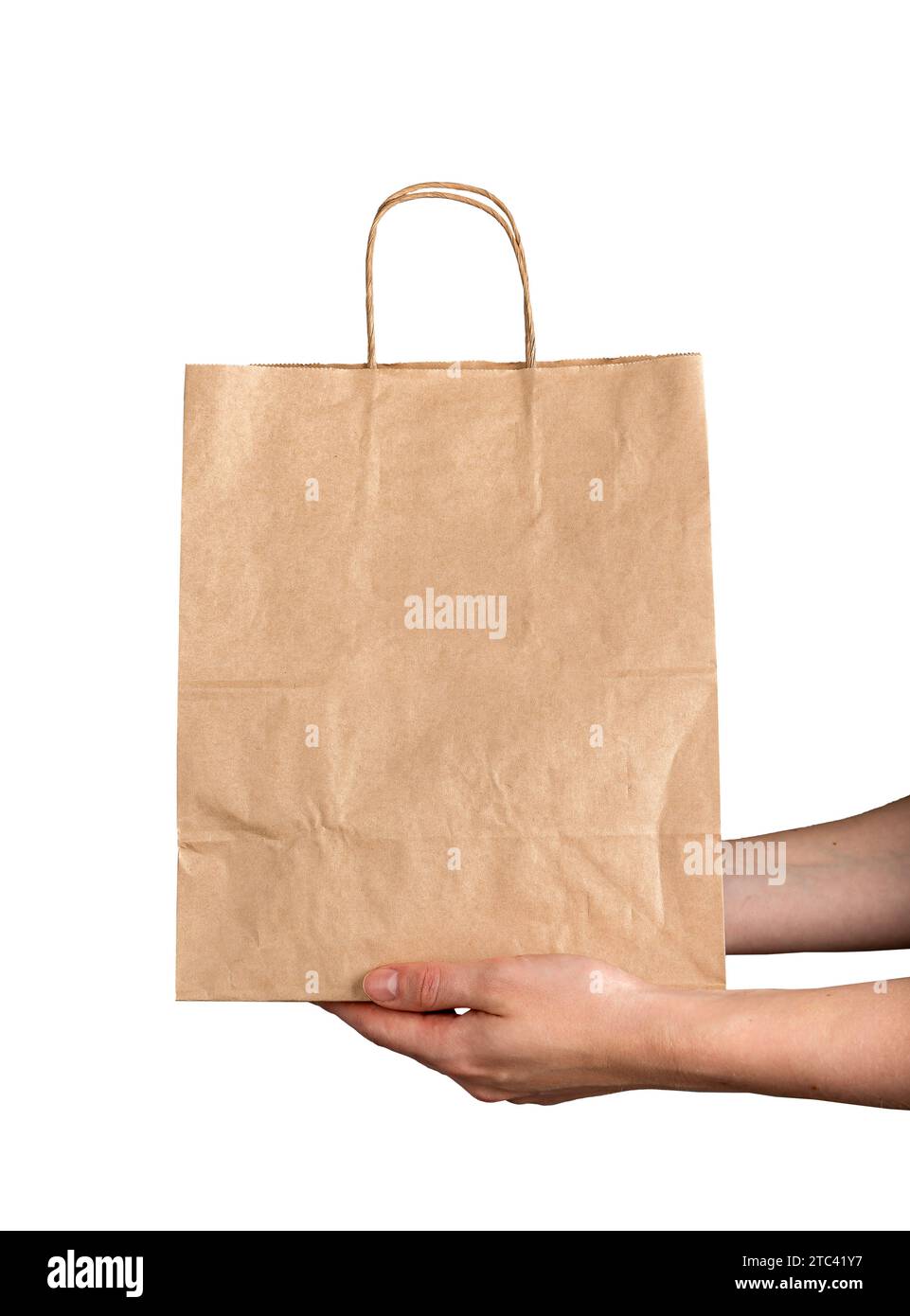 Hand holding paper bag, delivering food, giving order. Kraft brown ...