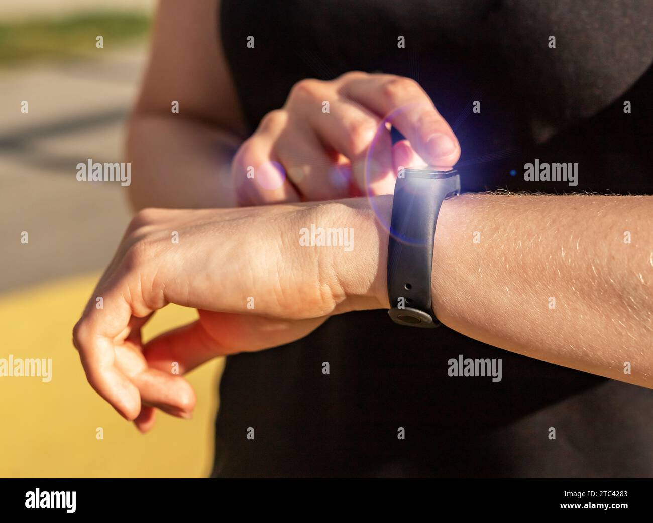 Using smart watch on hand closeup. Touching sports smartwatch for ...