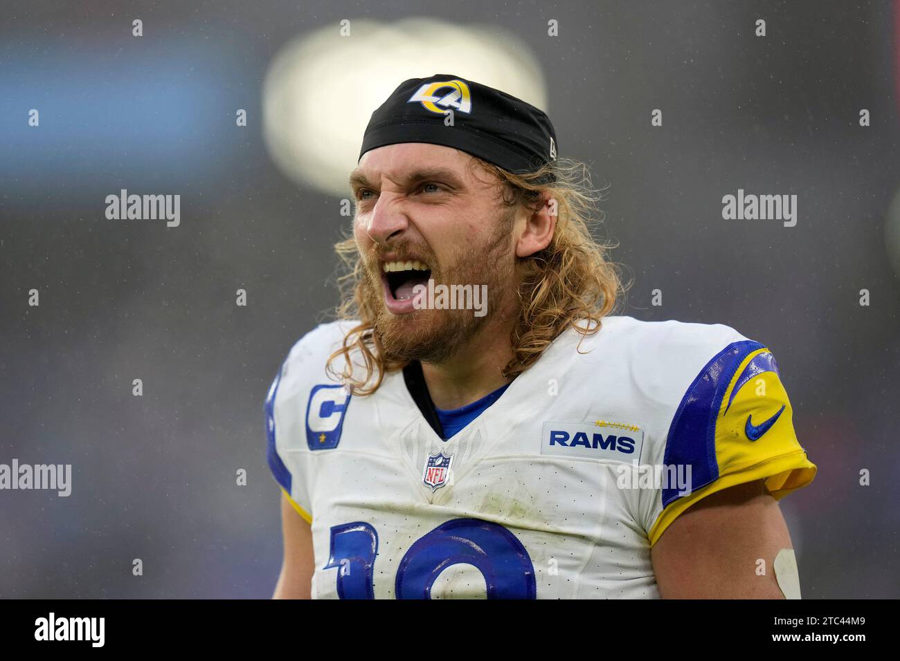 Los Angeles Rams' Ben Skowronek shouts as the rain pours down during ...