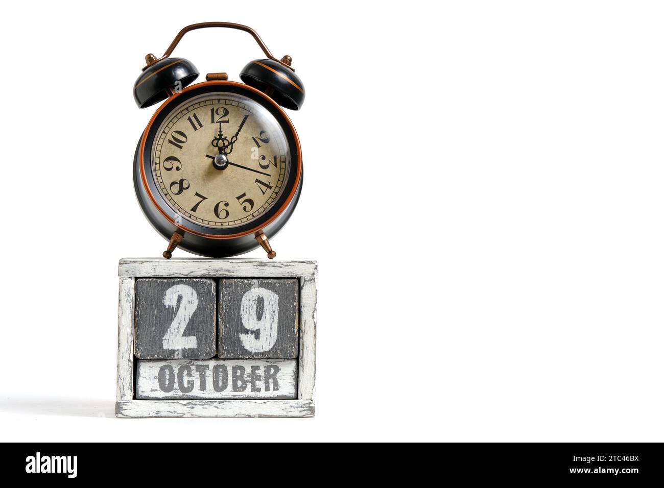 October 29 on wooden calendar with alarm clock white background Stock ...