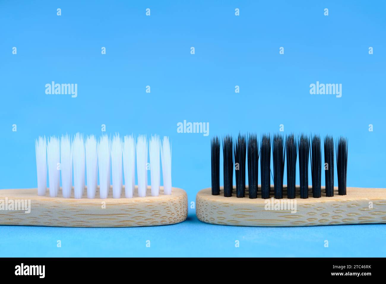 Eco friendly wooden toothbrushes with white and black bristles blue ...