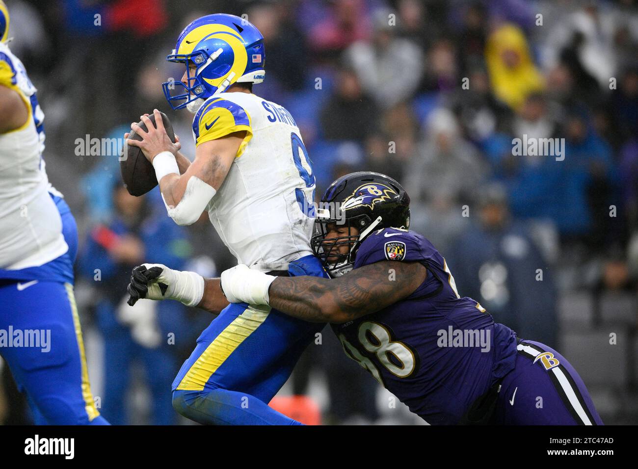 Baltimore Ravens defensive tackle Travis Jones (98) sacks Los Angeles ...