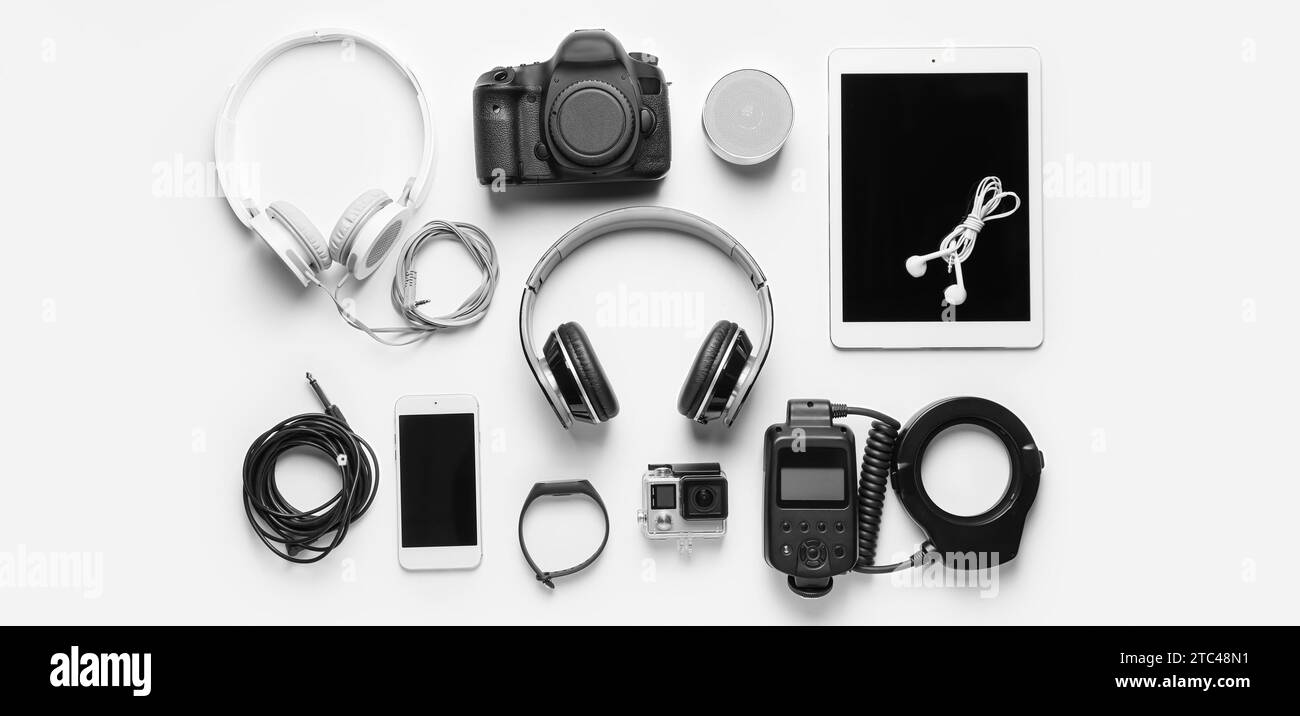 Different modern devices and gadgets on white background Stock Photo ...