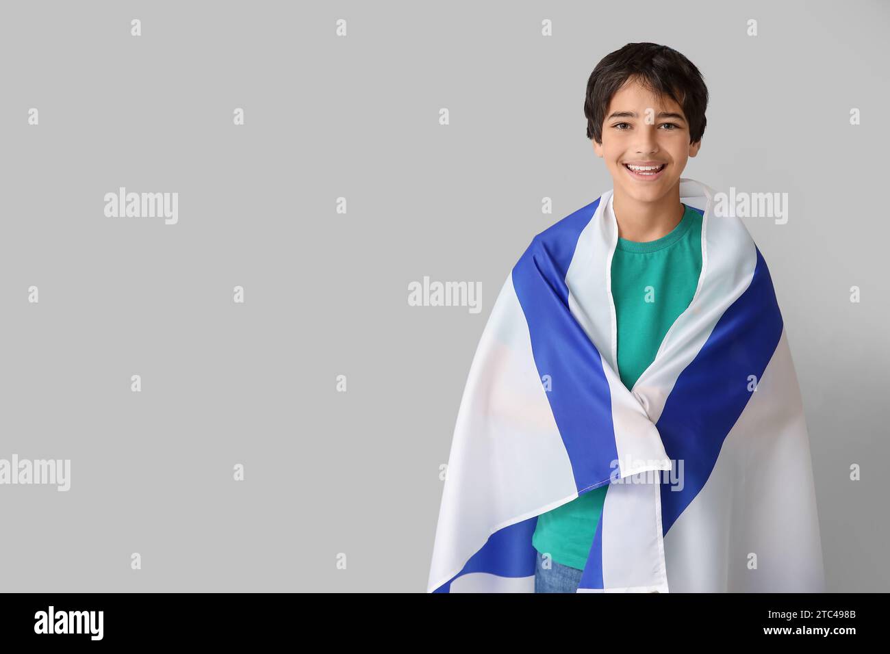 Little boy with Israel flag on grey background Stock Photo - Alamy