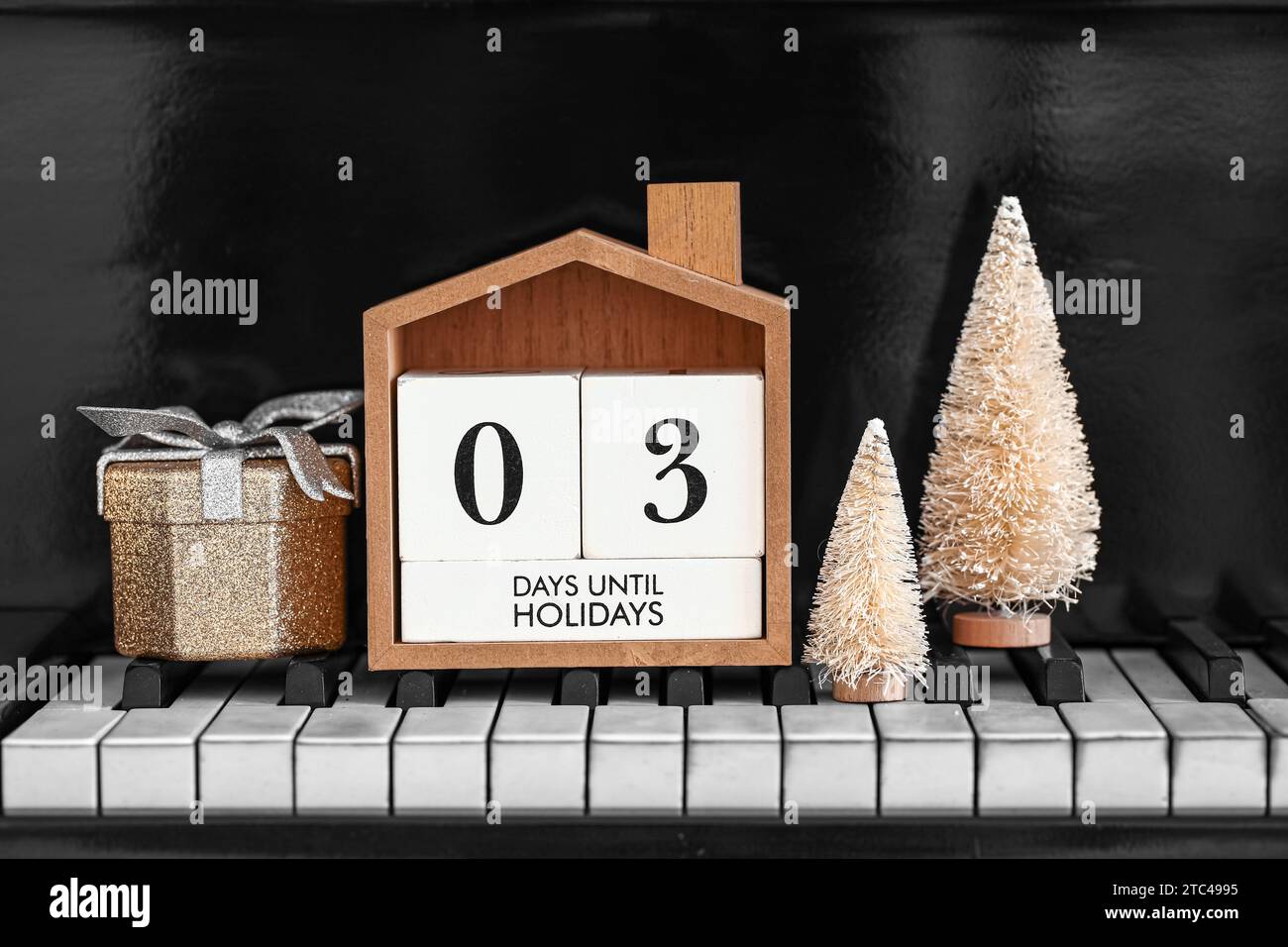 Calendar with text 3 DAYS UNTIL HOLIDAYS and Christmas decorations on ...