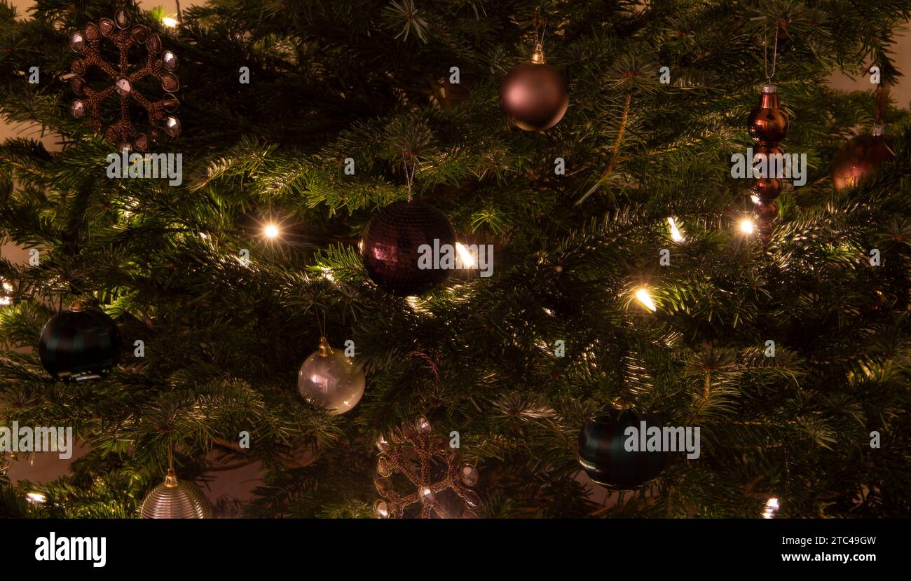 Christmas tree with decorations and lights Stock Photo - Alamy