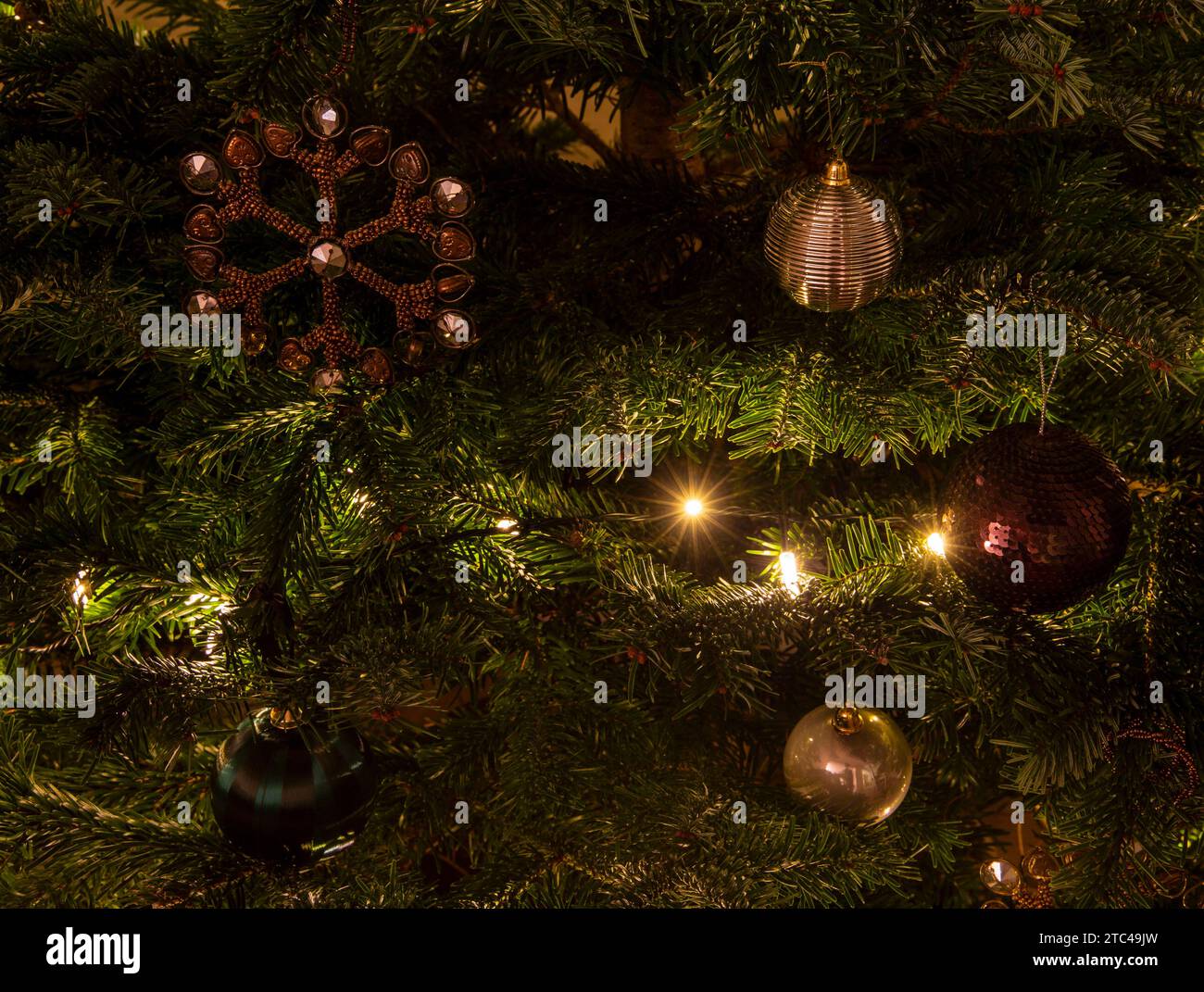 Christmas tree with decorations and lights Stock Photo - Alamy