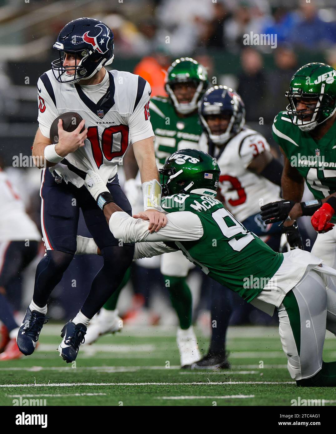 Houston Texans quarterback Davis Mills (10) is sacked by New York Jets ...