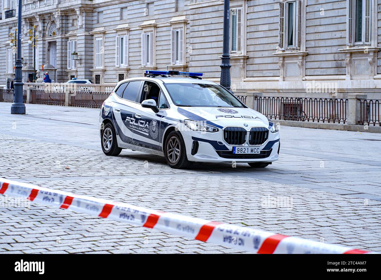 A national police vehicle circulates in front of the main gate of the ...