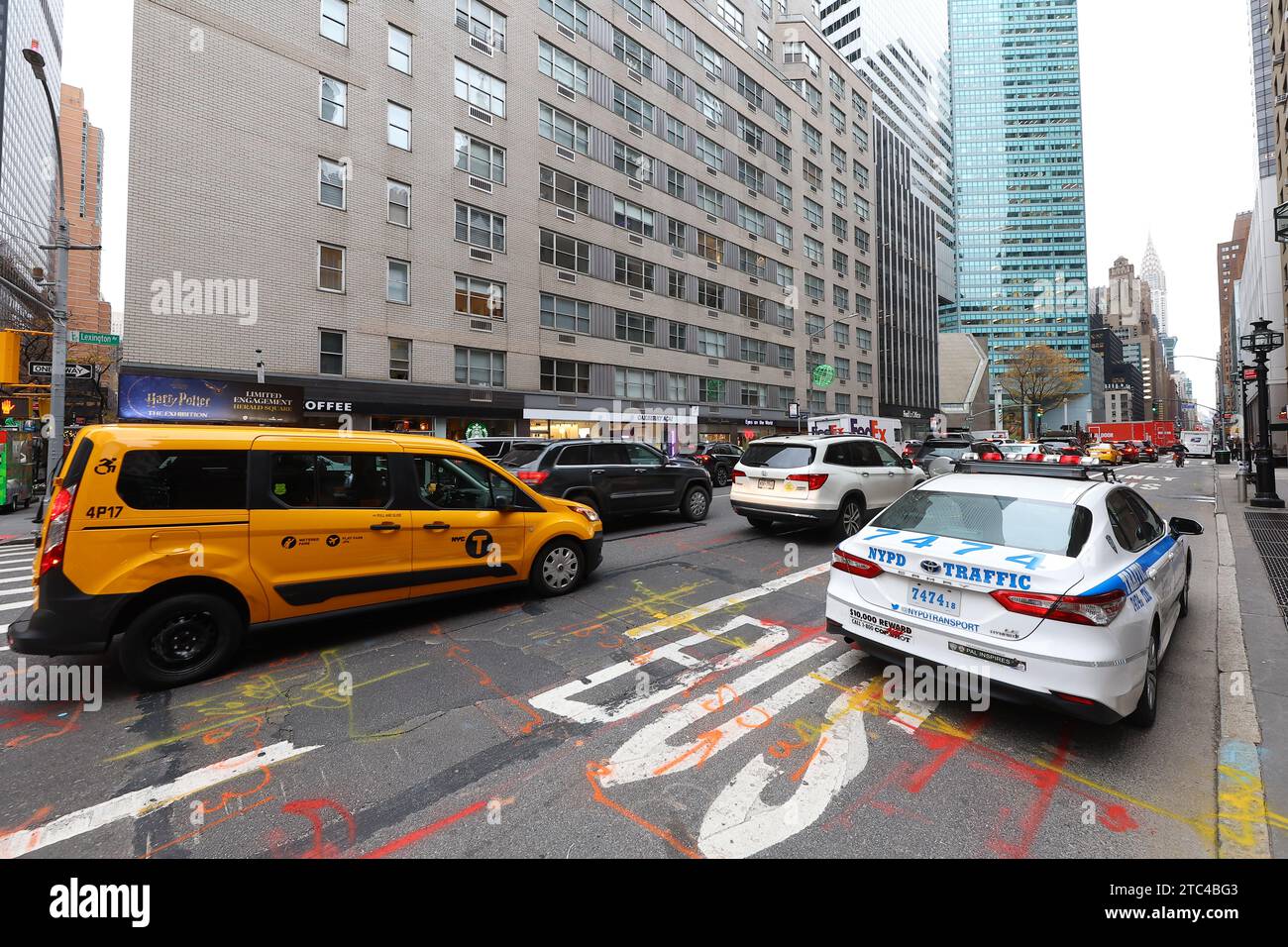 Traffic moves slowly in midtown Manhattan on Wednesday, Dec. 6, 2023 ...