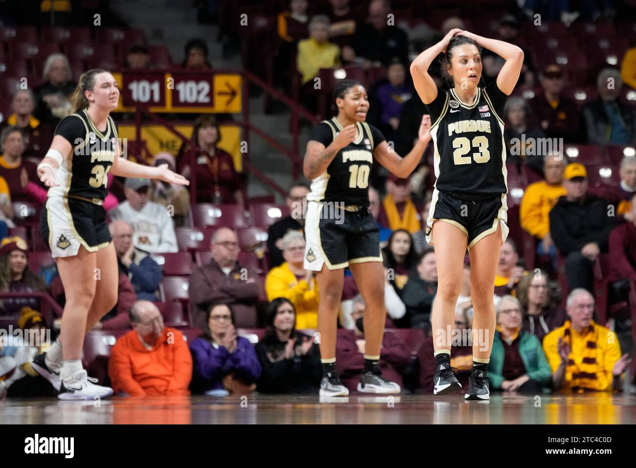 Purdue forward Caitlyn Harper (34), guard Jeanae Terry (10) and guard ...