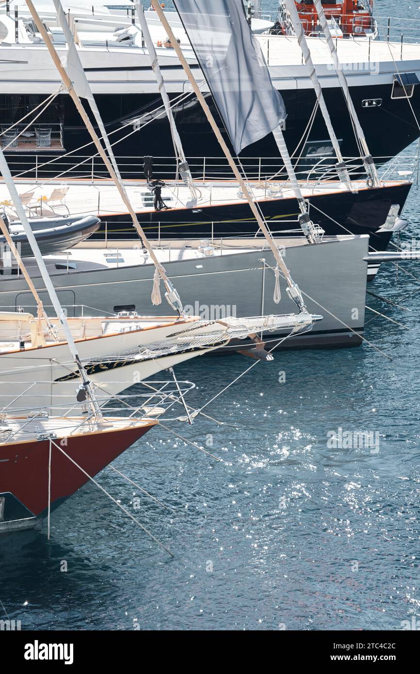 Sun glare on glossy board boats, azure water, tranquillity in port ...