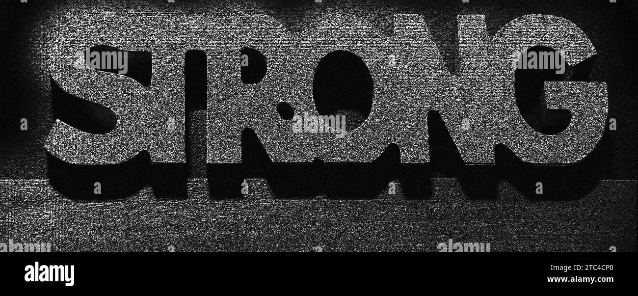 Black and white image shows the work strong. Word looks like stone and ...