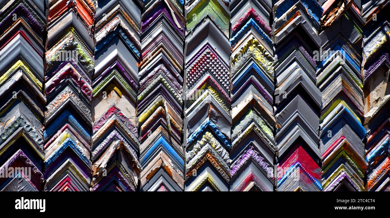 Background image of a wall composed of a miriad of picture frame ...