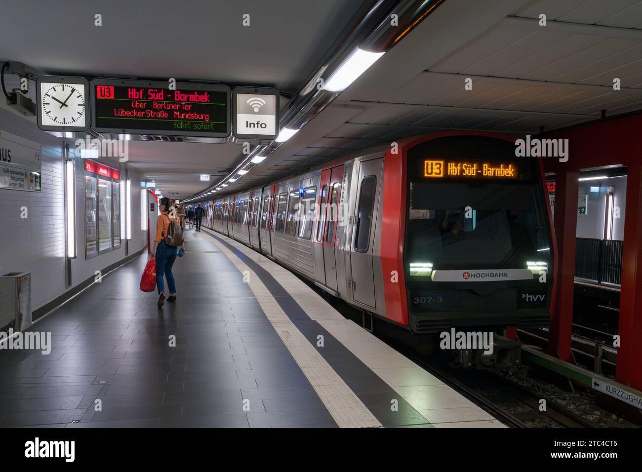 A U3 U-Bahn train arriving at the platform in a station on the Hamburg ...