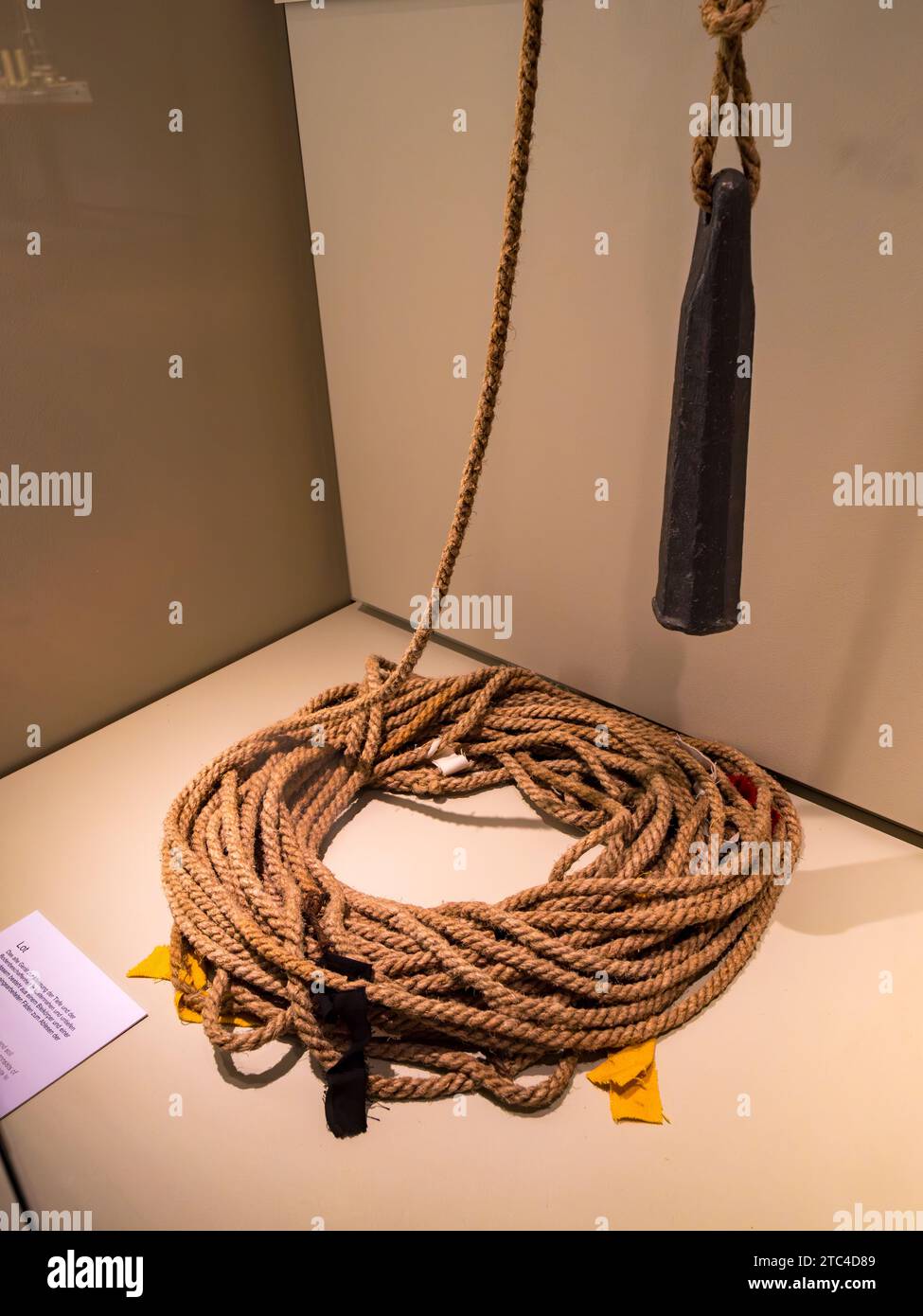 A plumb used to measure deapth and soil conditions in shallow water in ...