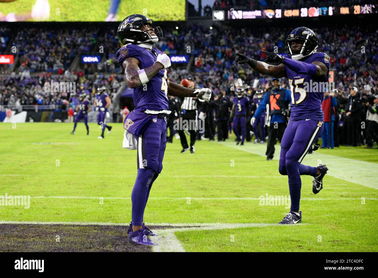 Baltimore Ravens wide receiver Zay Flowers, left, celebrates his ...