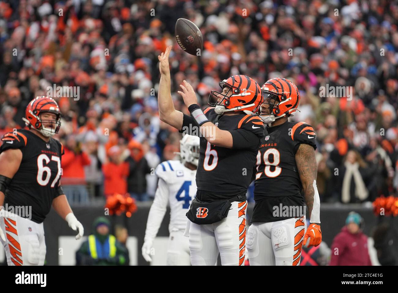Cincinnati Bengals quarterback Jake Browning (6) finger roll the ball ...
