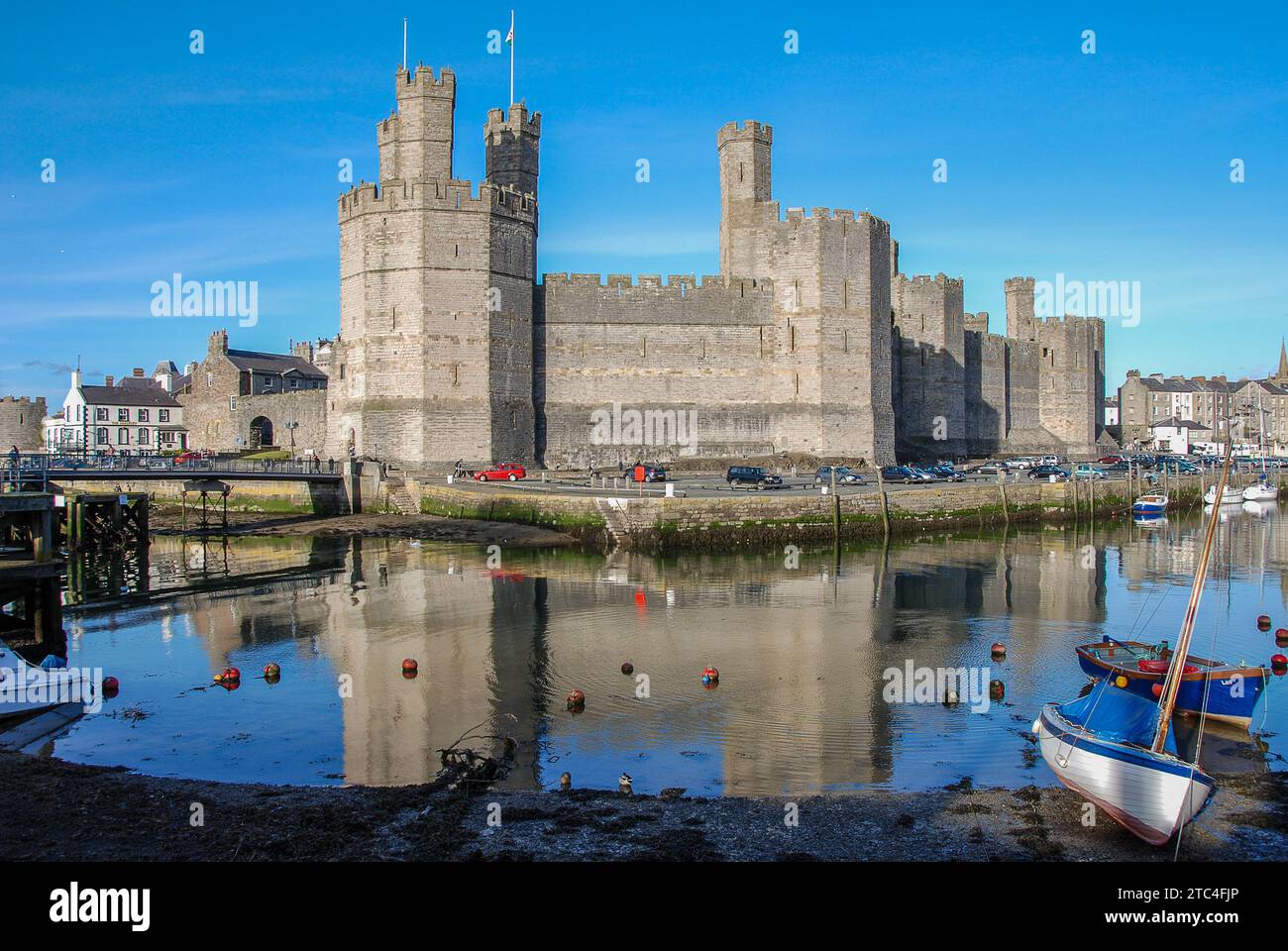 Caernarfon Castle in Caernarfon, Gwynedd in Wales was built by Edward I ...