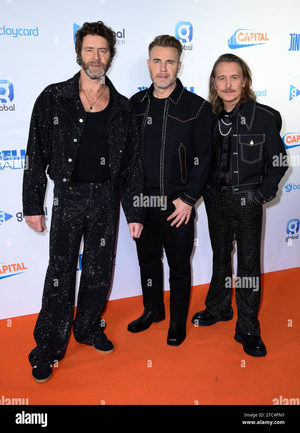 London, UK. December 10th, 2023. Howard Donald, Gary Barlow and Mark ...