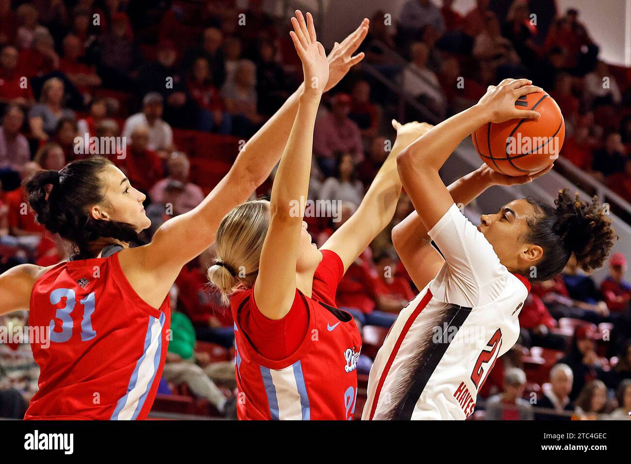 North Carolina State's Madison Hayes, right, shoots the ball over ...