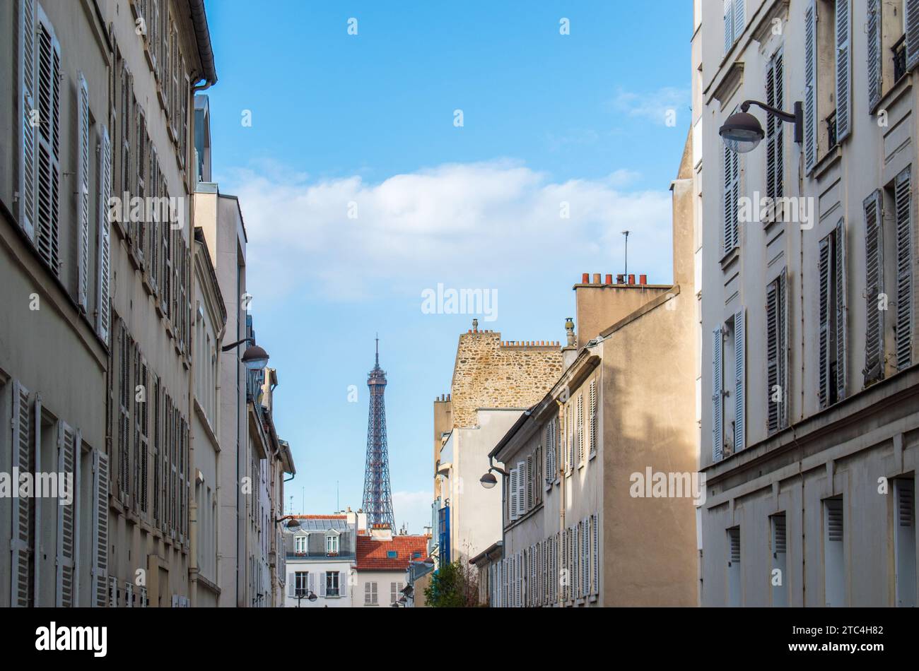 Narrow street with view of the Eiffel Tower, Paris, France Stock Photo ...