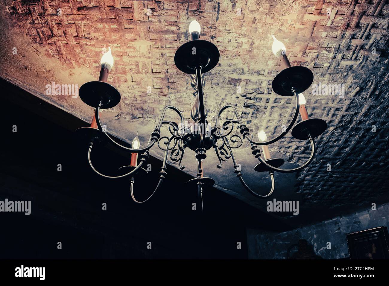 Old and ancient roof lamp with candles on a ruined ceiling Stock Photo ...