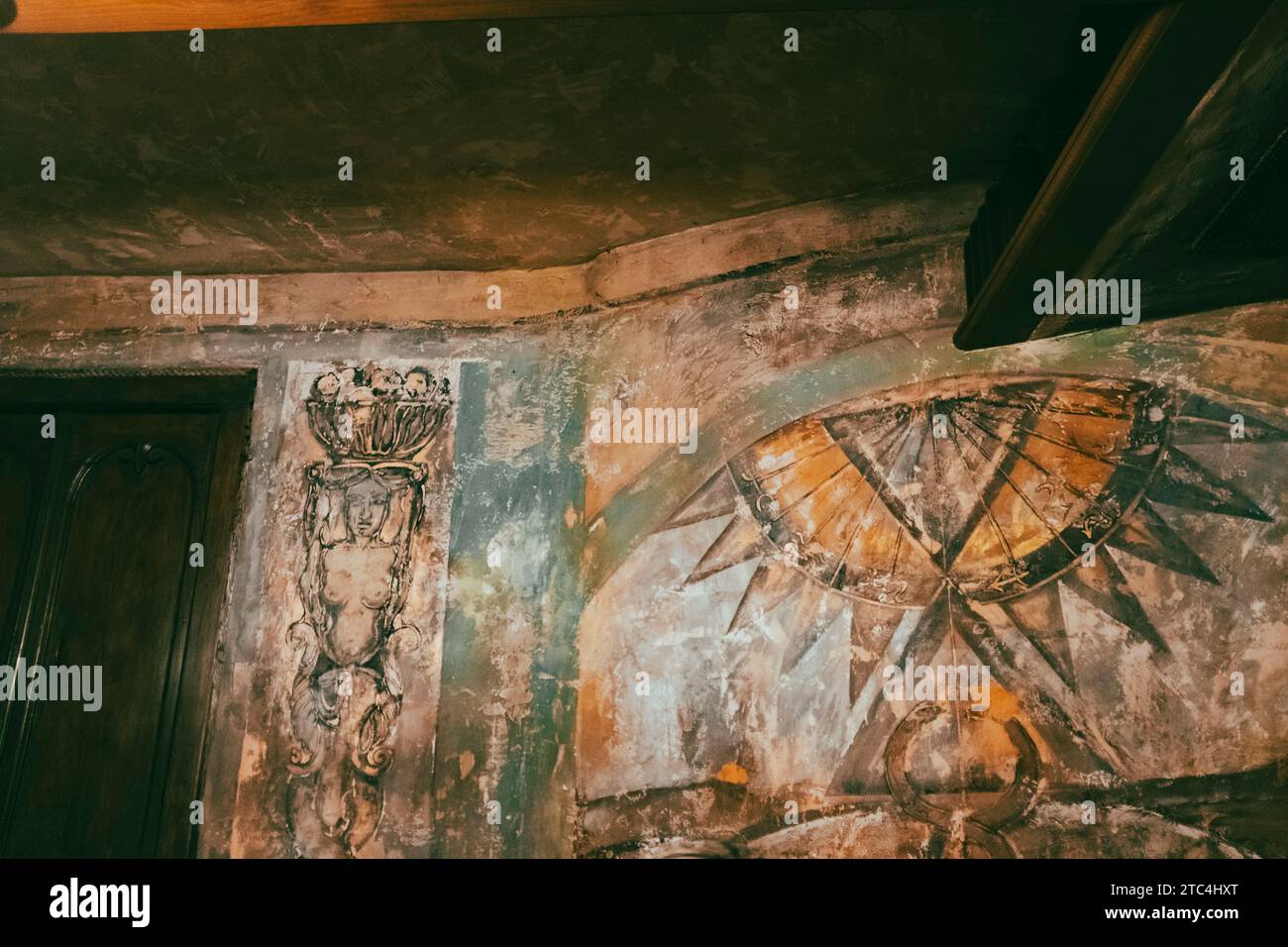 Old rusty paintings ruined on an old ruined interior domestic room ...