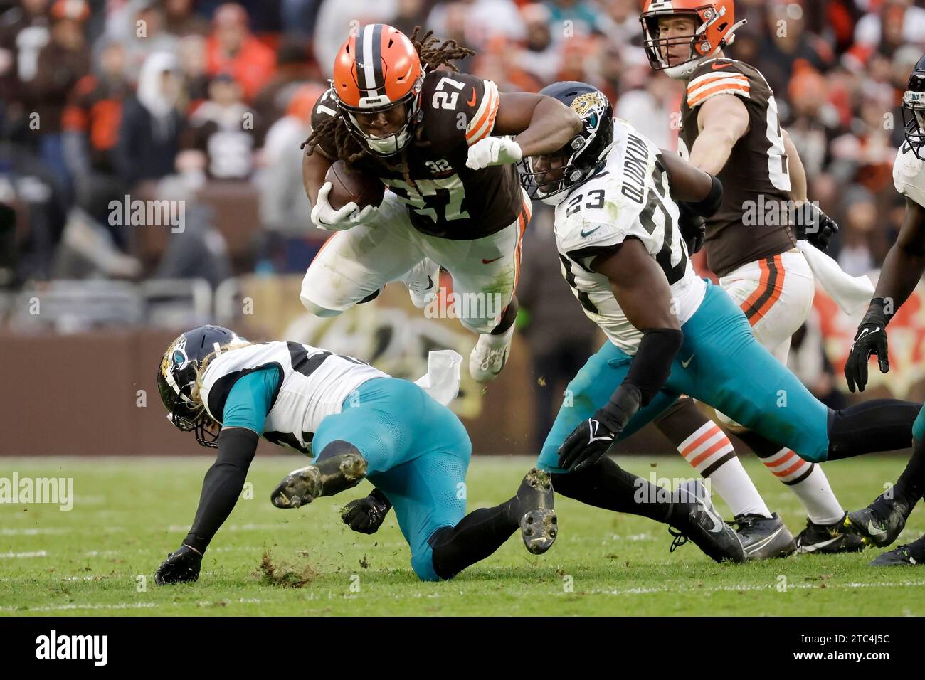 Cleveland Browns running back Kareem Hunt (27) dives over Jacksonville ...