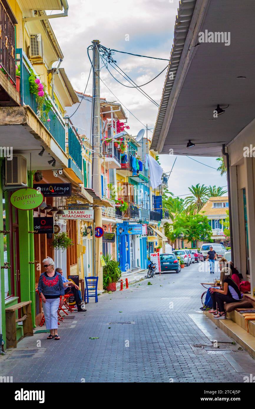 Lefkada town main commercial street Greece. Colorful houses,stores and ...