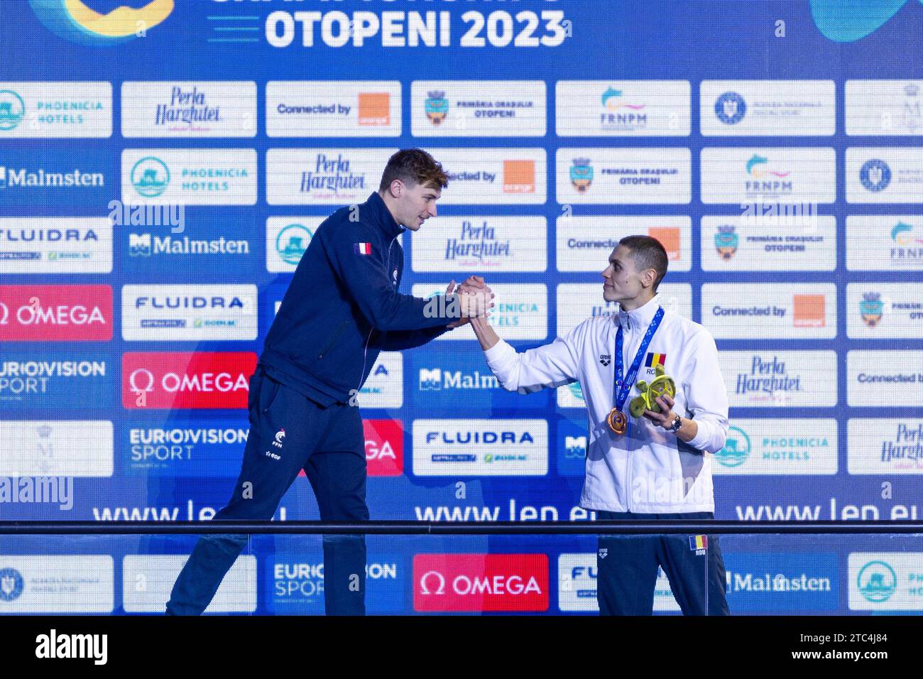 Grousset Maxime of France and David Popovici of Romania shaking hands ...