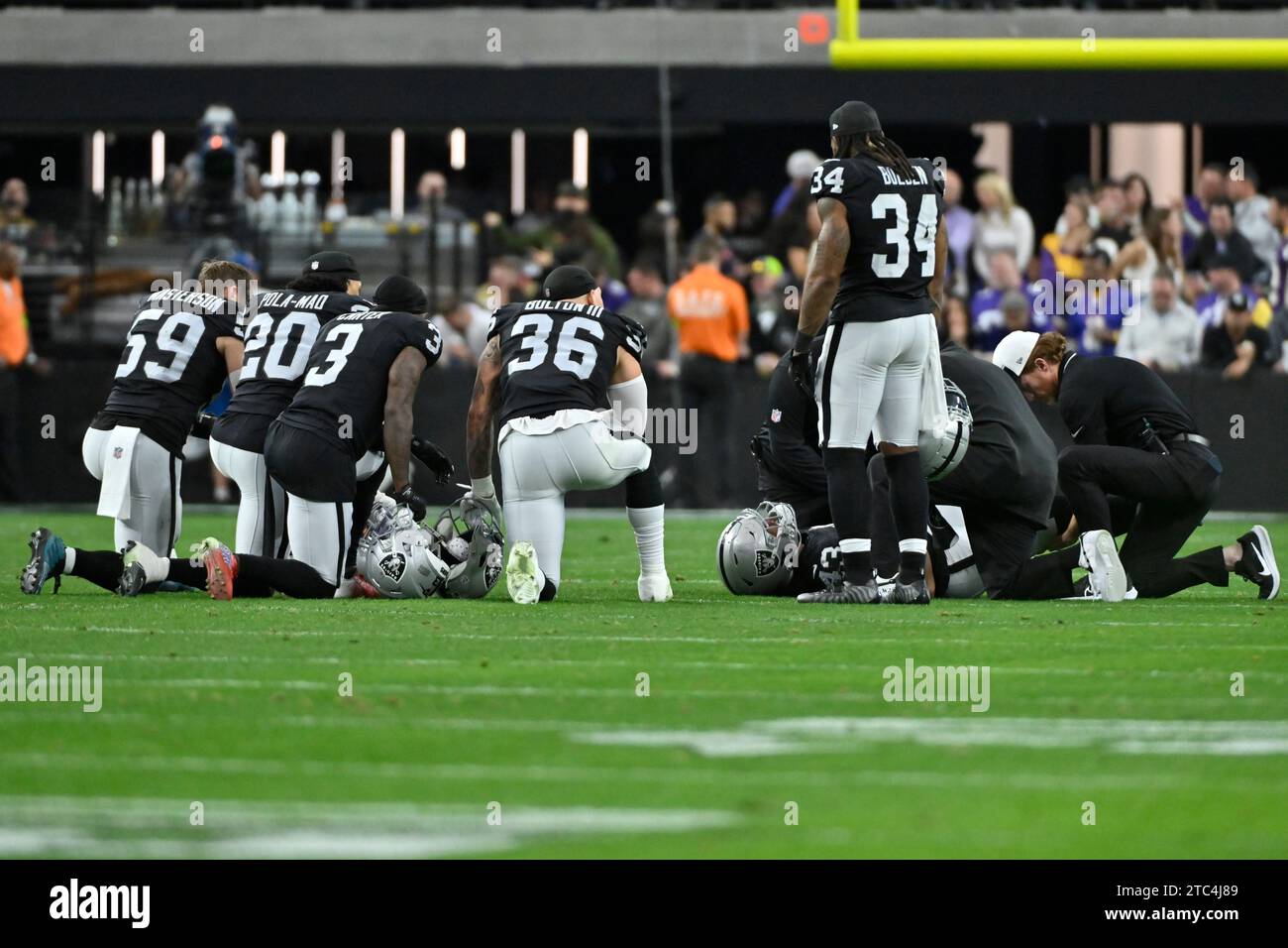 Las Vegas Raiders linebacker Kana'i Mauga is helped after an injury as ...