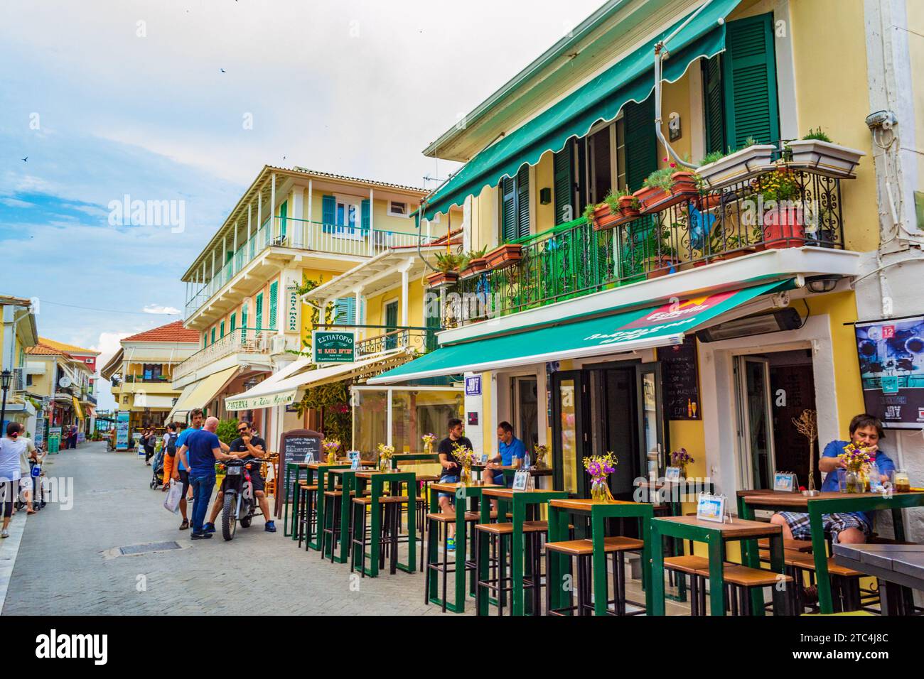 Lefkada town main commercial street Greece. Colorful houses,stores and ...