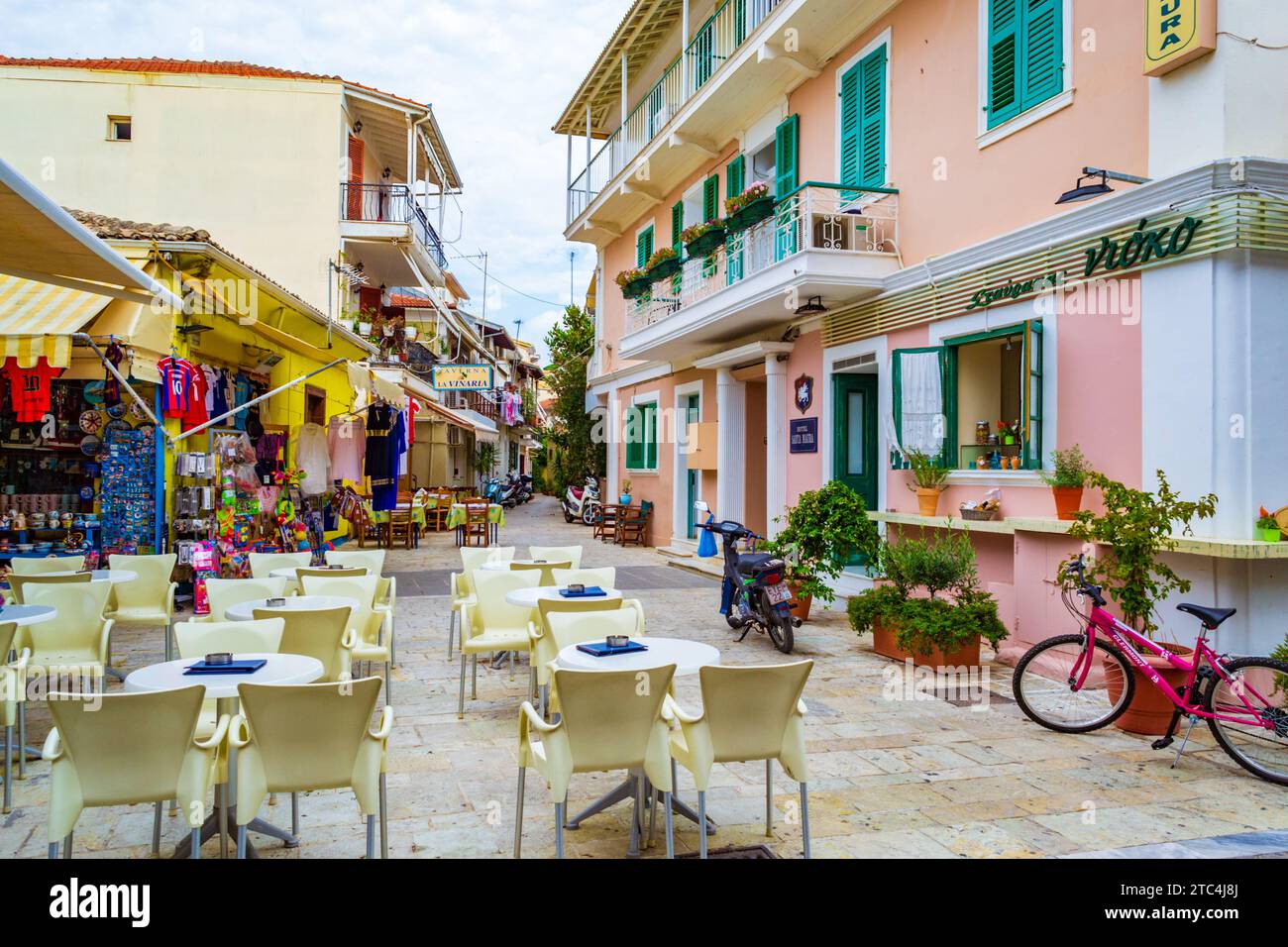 Lefkada town main commercial street Greece. Colorful houses,stores and ...