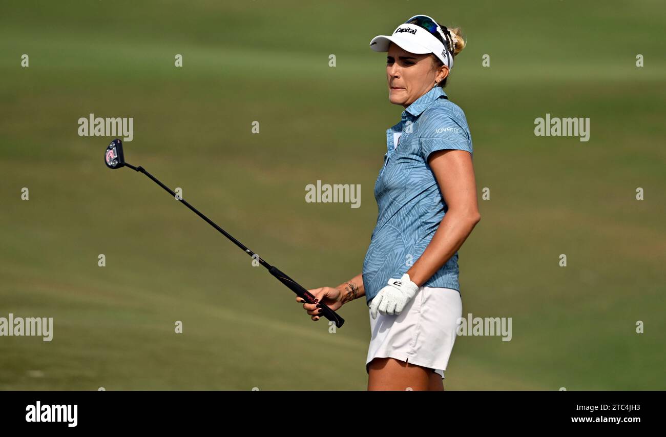 Lexi Thompson watches a putt on the ninth green during the final round ...