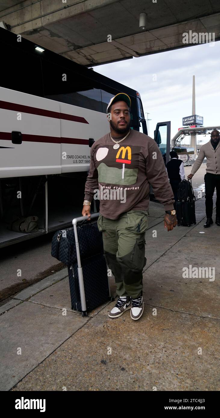 Carolina Panthers guard Justin McCray arrives with the team before an ...