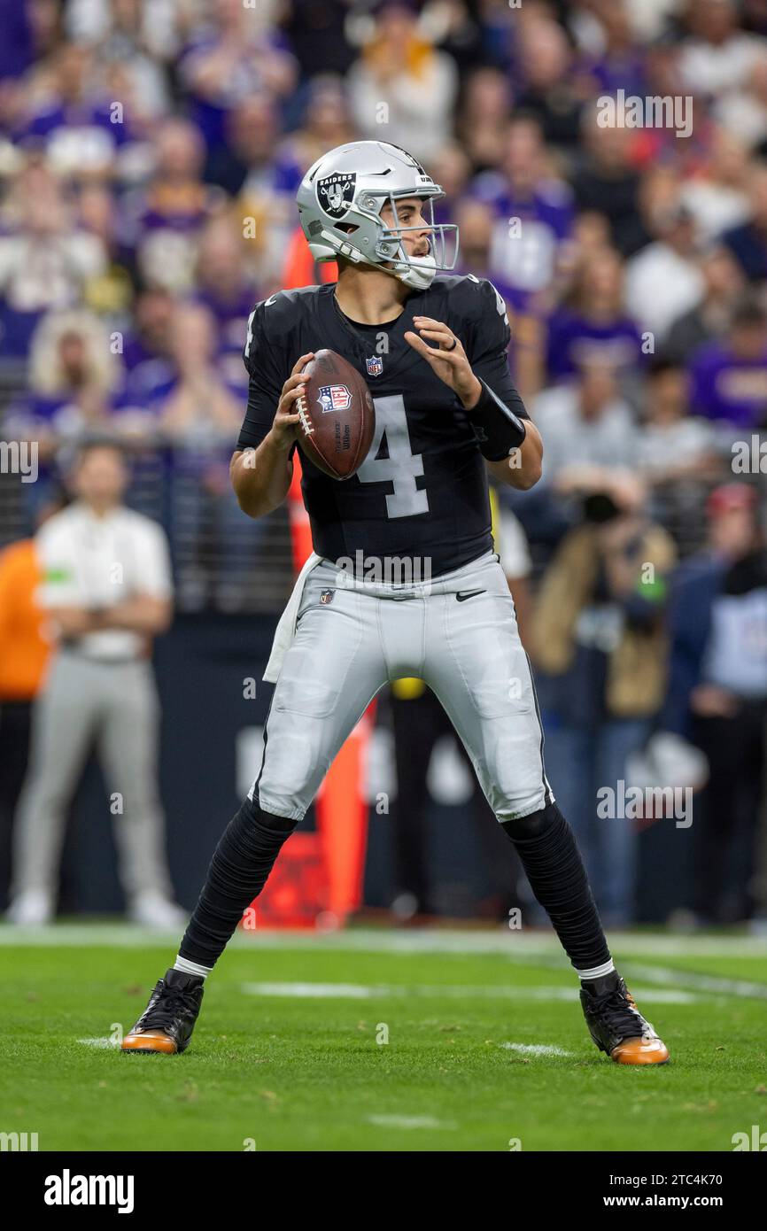 Las Vegas Raiders quarterback Aiden O'Connell (4) drops back to pass ...