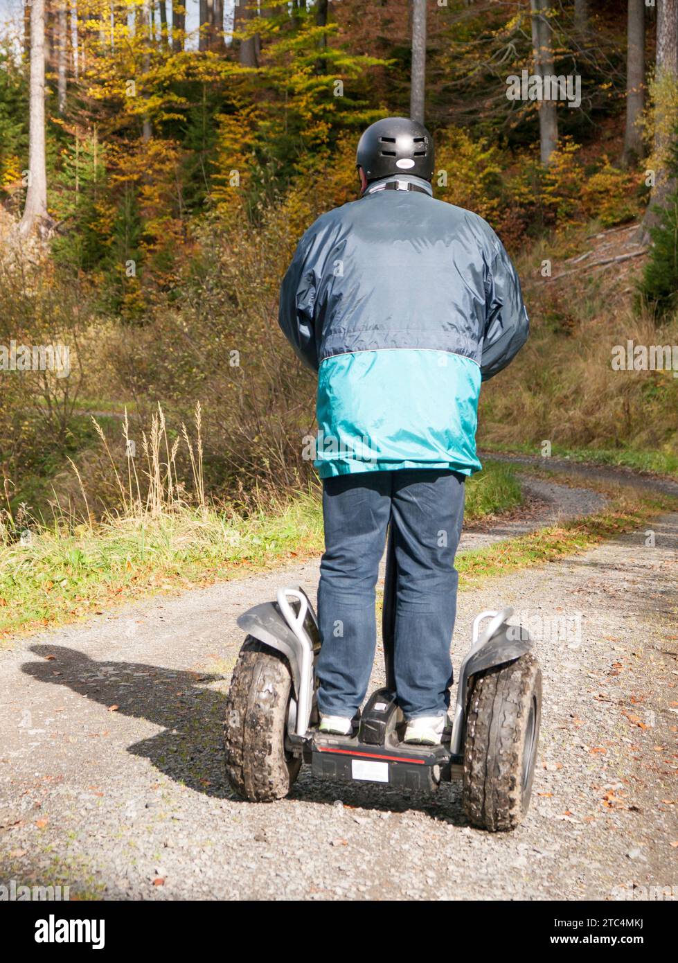 Man driving on segway in forest terrain Stock Photo - Alamy
