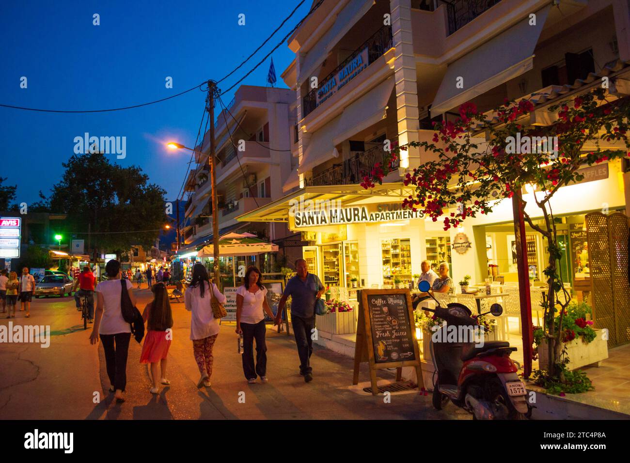 Night view of commercial street at Nydri town Lefkada Greece ...