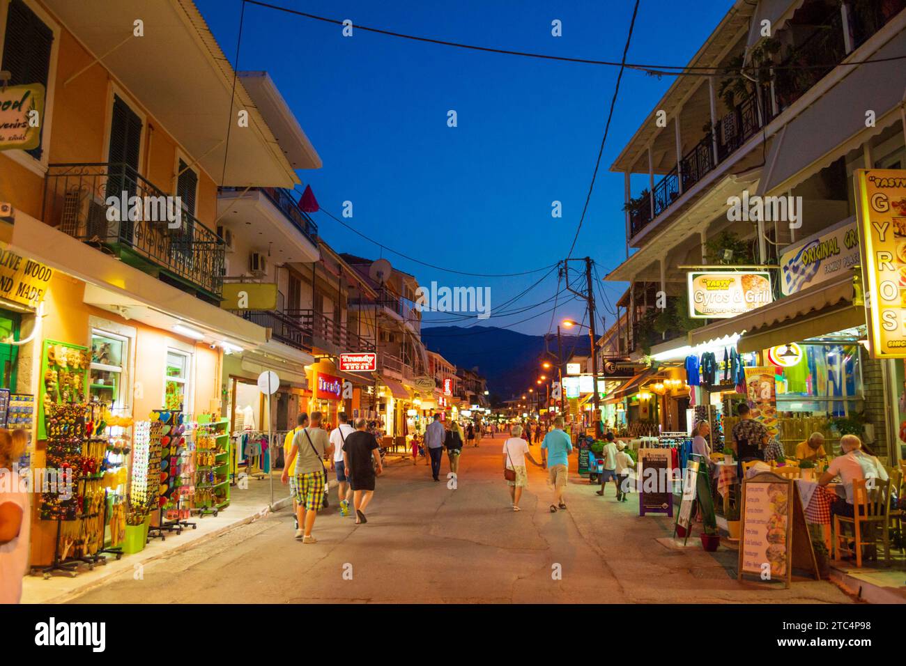Night view of commercial street at Nydri town Lefkada Greece ...