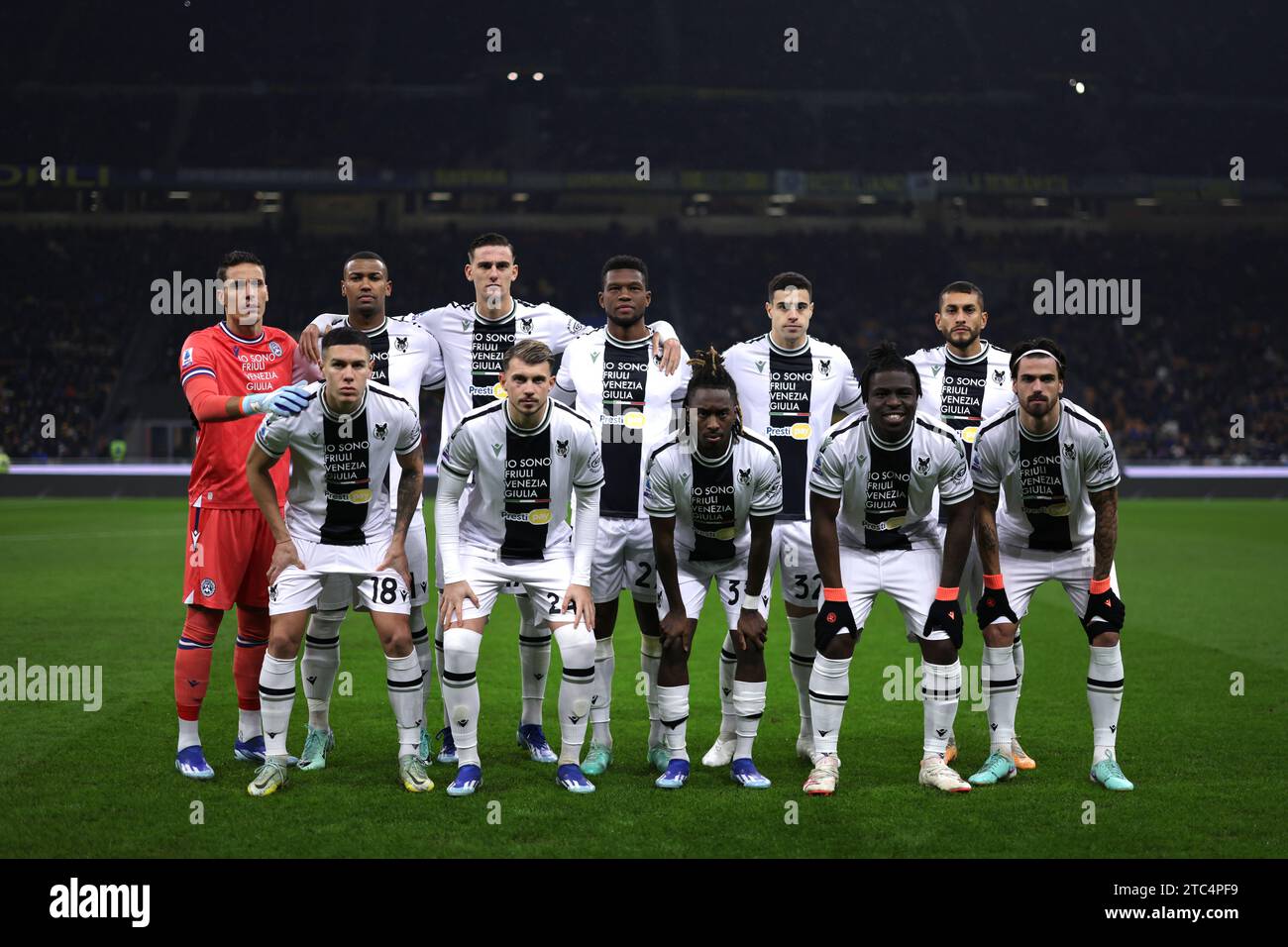 Milan, Italy. 9th Dec, 2023. The Udinese Calcio starting eleven line up ...