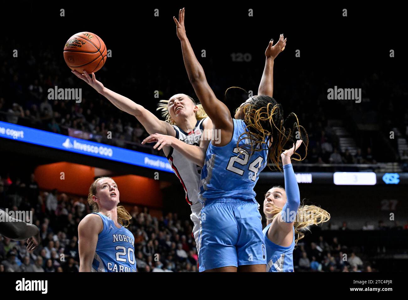 UConn guard Paige Bueckers shoots as North Carolina guard Indya Nivar (24) defends in the first ...