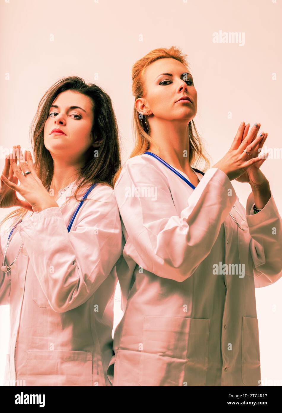 Two daunting doctors embody menace with their stern postures, exuding a ...