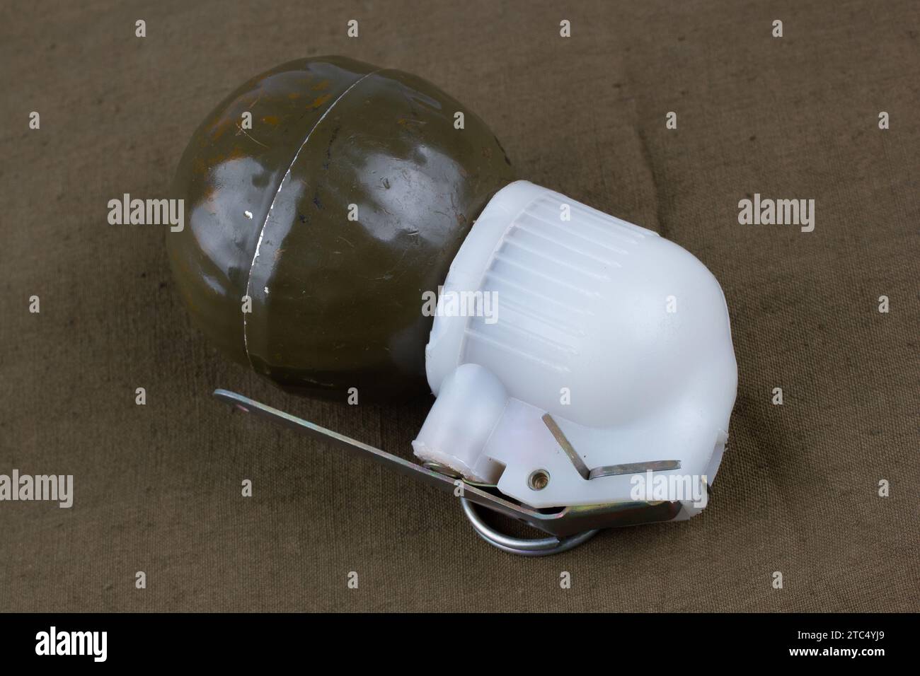 Soviet hand grenade RGN on khaki canvas background Stock Photo - Alamy