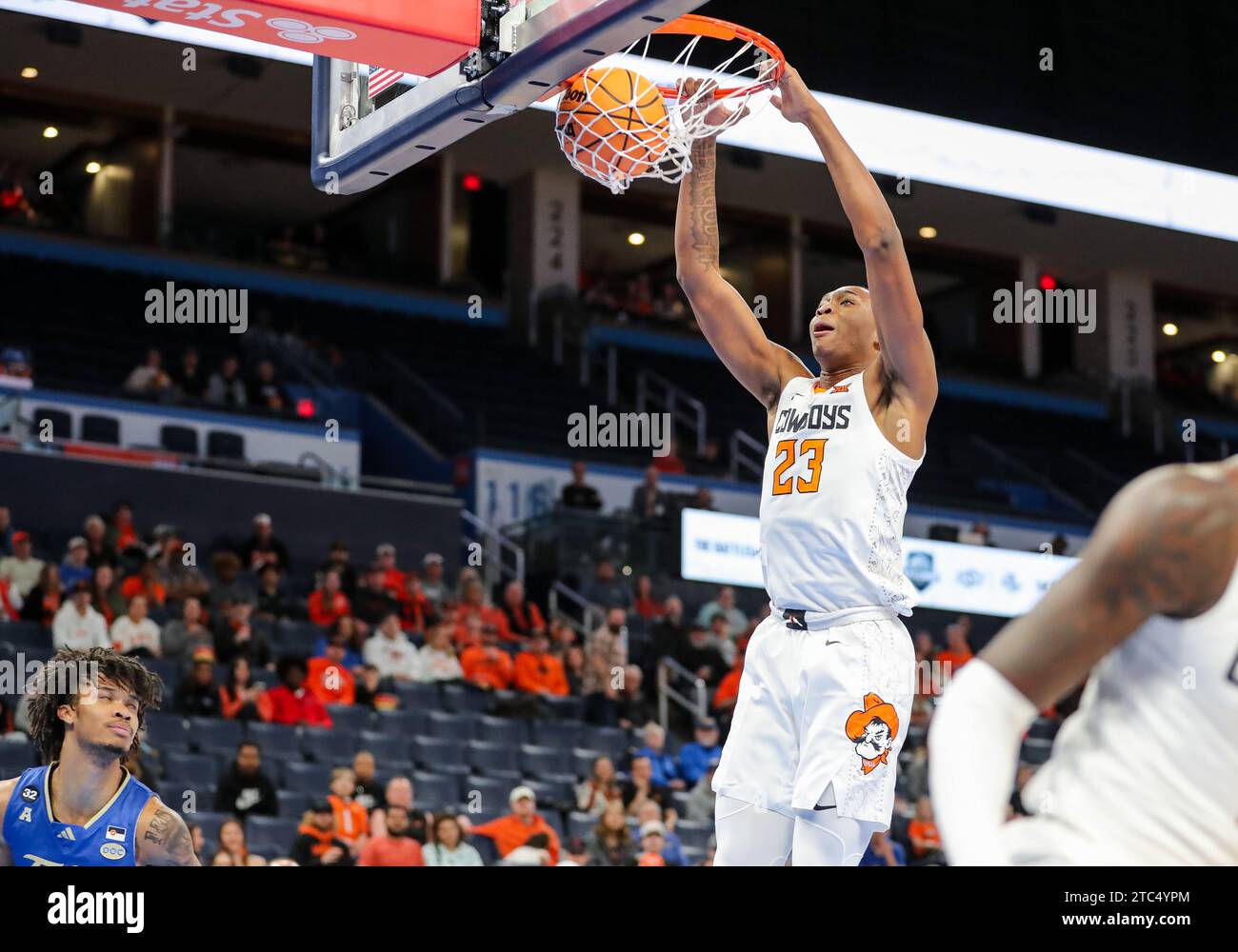 December 10, 2023: .Oklahoma State Cowboys center Brandon Garrison (23 ...